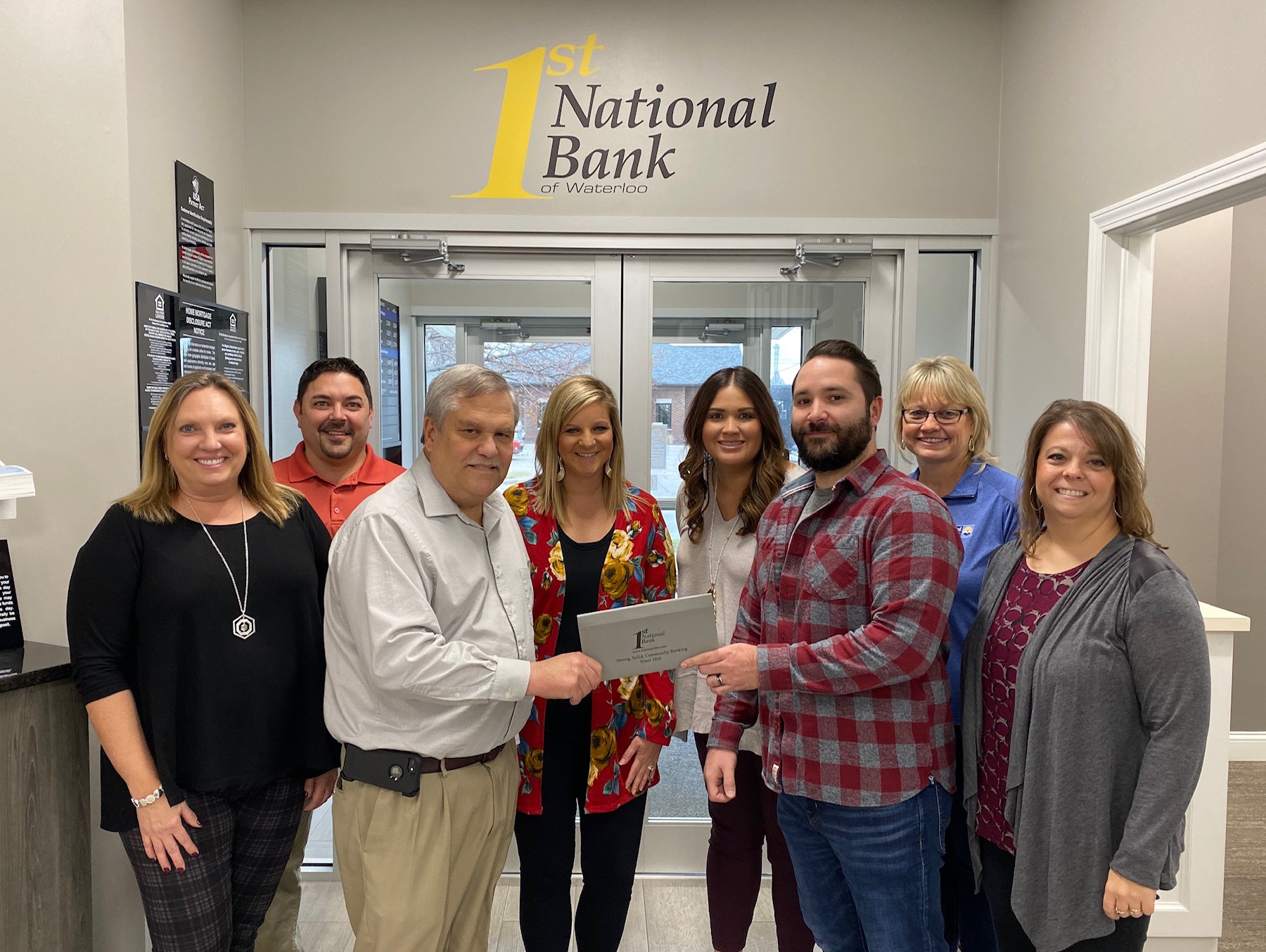 First National Bank of Waterloo makes donation to United Way of ...